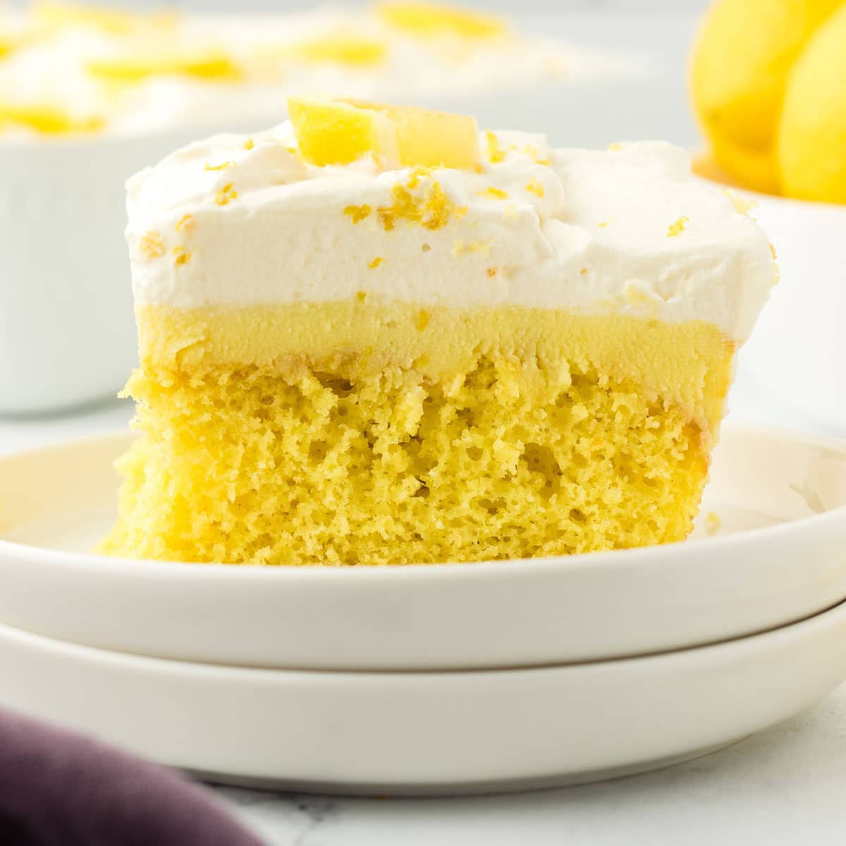 Best Lemon Poke Cake Recipe (Easy and Refreshing) - Amira's Pantry