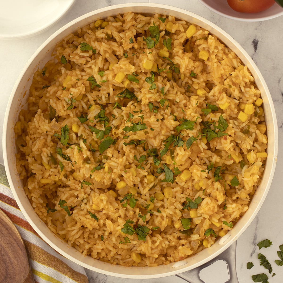 Mexican Rice with Corn (Easy and Quick Side Dish) - Amira's Pantry